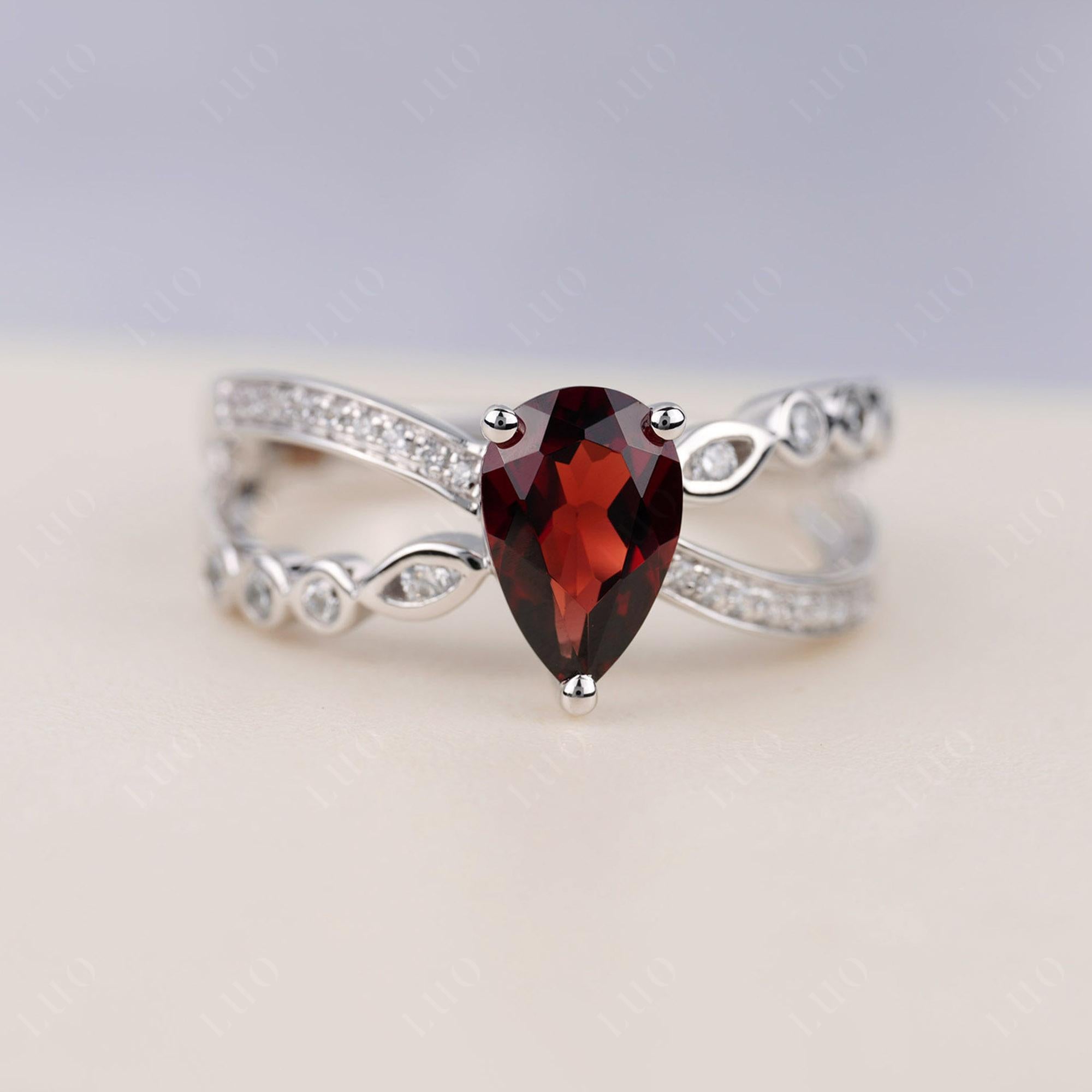 Pear Shaped Garnet Crossover Ring | LUO