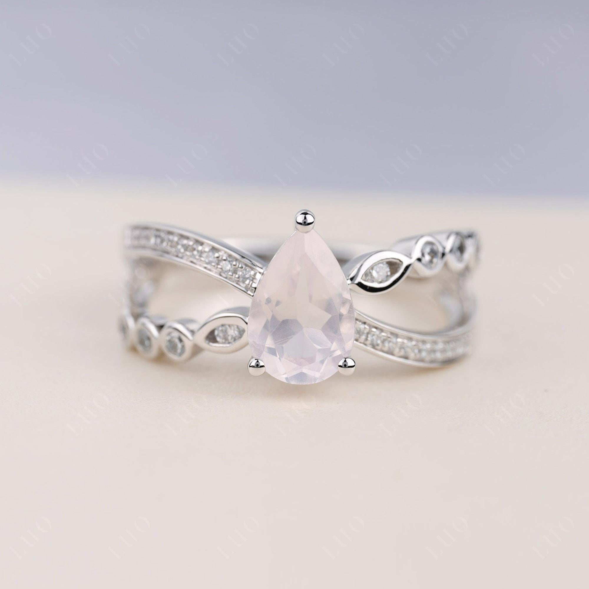 Pear Shaped Rose Quartz Crossover Ring | LUO