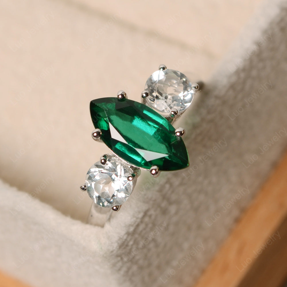 three stone emerald rings
