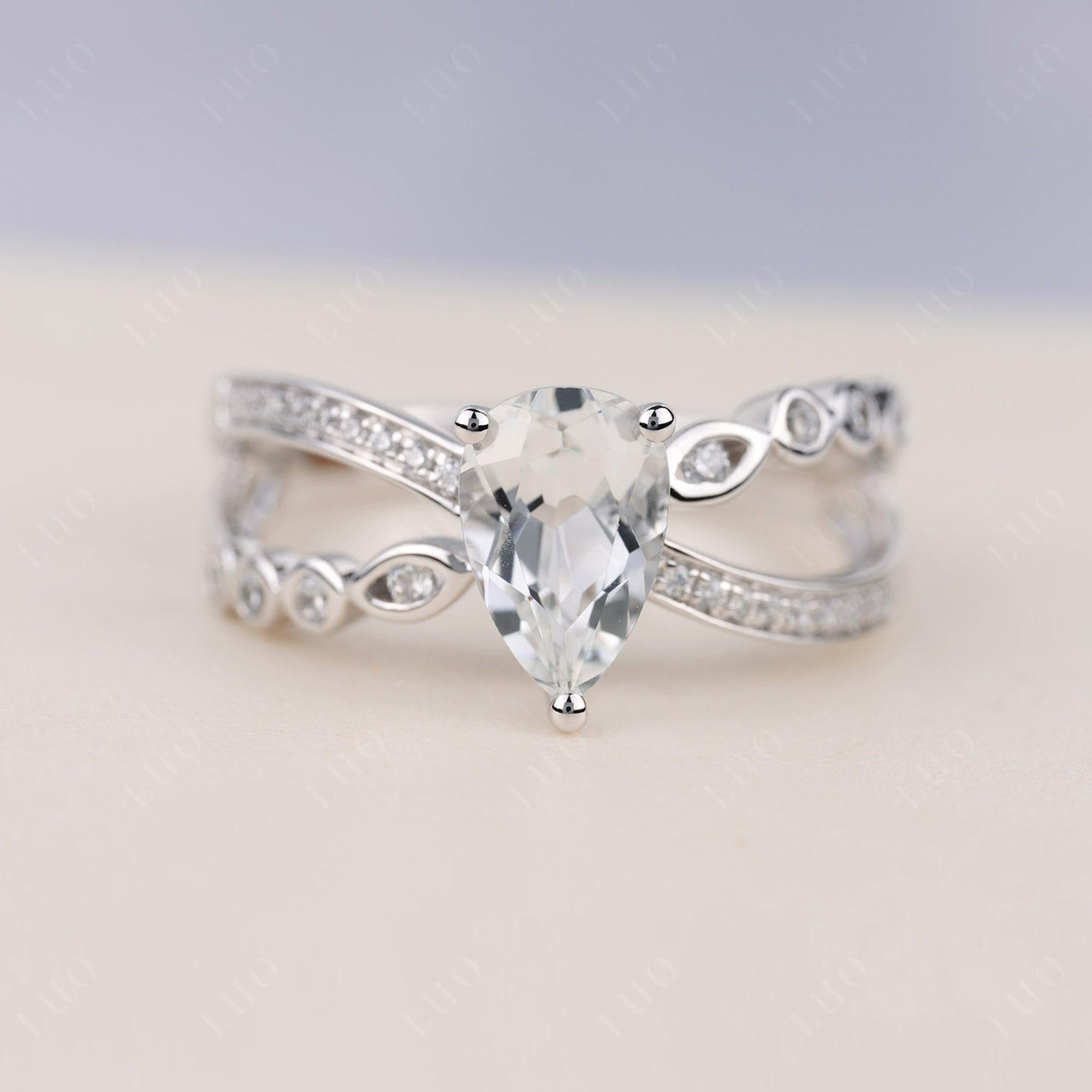 Pear Shaped White Topaz Crossover Ring | LUO